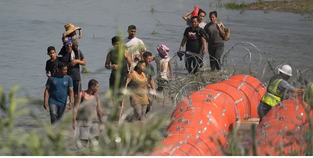 Nearly 80% of Texas' floating border barrier is technically in Mexico ...